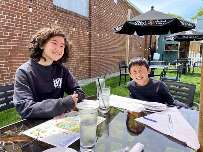 Happy diners enjoying the outdoor space capture exactly what Penny Lane Pub delivers: good food, fresh air, and genuine smiles.