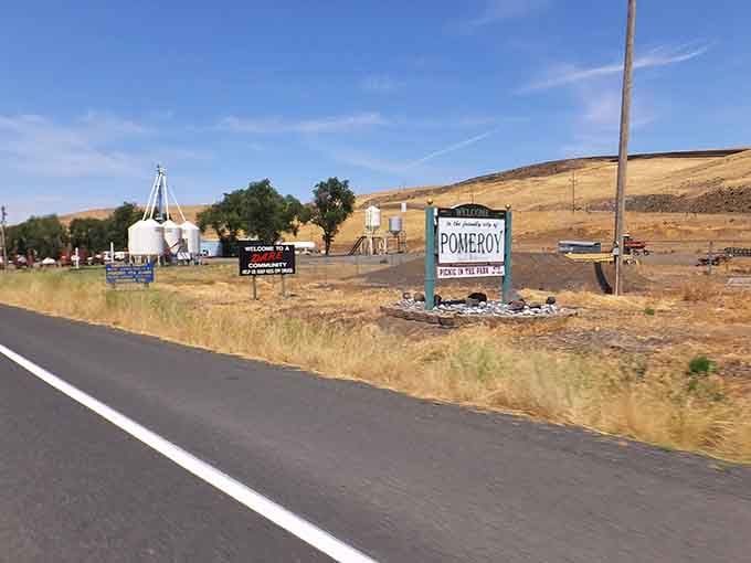Welcome sign along the highway that most people zoom past, missing out on what's actually worth discovering here.