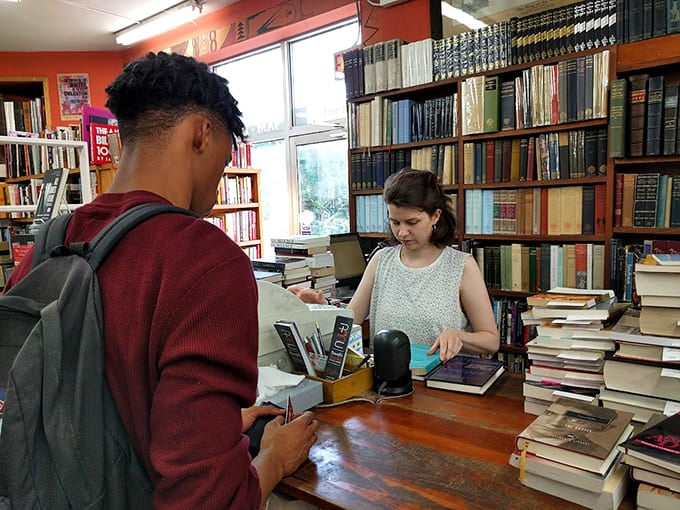 The checkout counter where your carefully planned budget goes to die, but your reading list comes alive.
