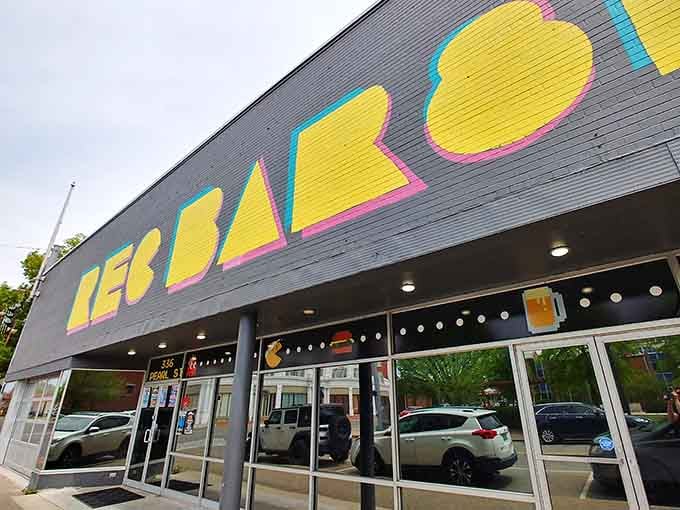 Bold yellow letters announce your destination like a beacon calling every kid who ever loved Saturday mornings.