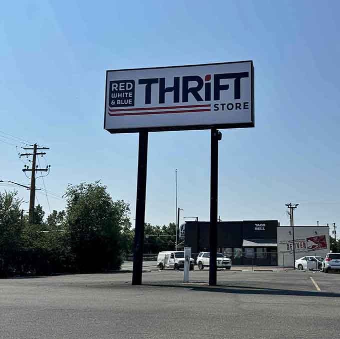 That tall sign visible from the road, calling to bargain hunters like a lighthouse guides ships to shore.