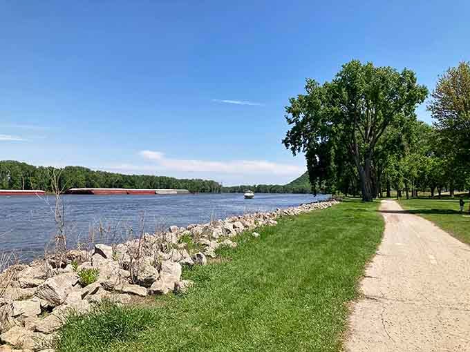 Colvill Park's riverside path invites leisurely strolls where the Mississippi provides the soundtrack and the scenery.
