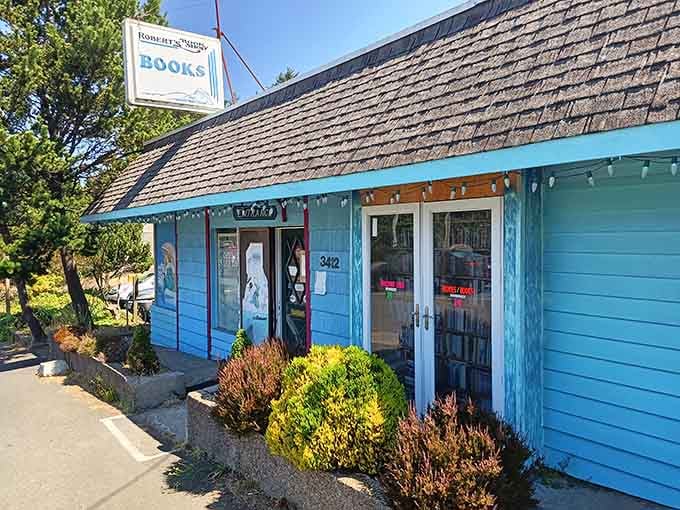 The cheerful blue building practically glows with personality, complete with its own dedicated parking painted right on.