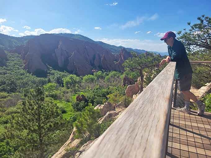 Overlook viewpoints reveal the full scope of this geological amphitheater stretching toward distant mountain ranges beyond.