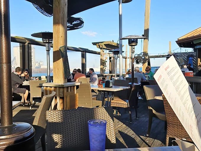 The outdoor patio delivers breezes, views, and the kind of Florida dining experience that creates lasting memories.