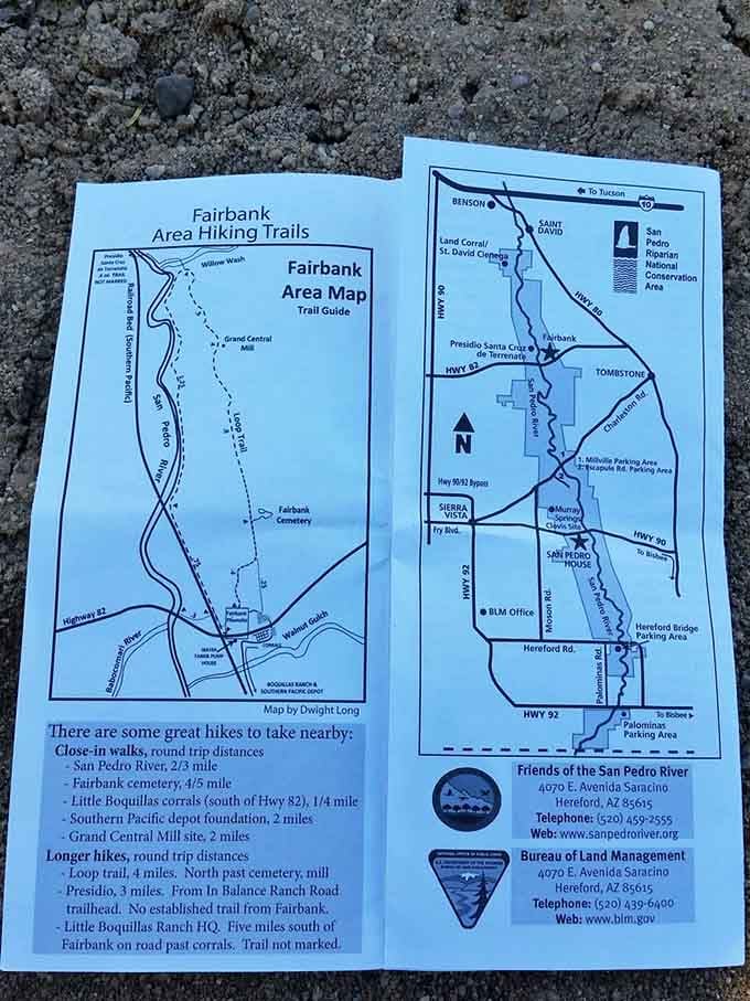 Trail maps show the various hiking options available, from quick cemetery visits to longer riverside exploration routes.