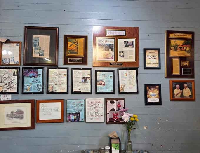 A wall of framed newspaper clippings and awards proves that great food eventually gets the recognition it deserves.