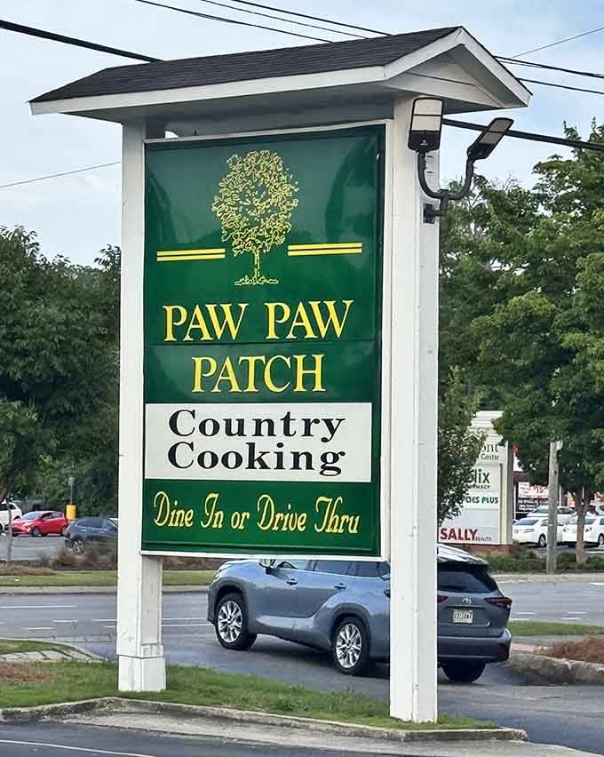 The Paw Paw Patch sign stands proud, promising "Country Cooking" with the confidence of someone who knows exactly what you need.