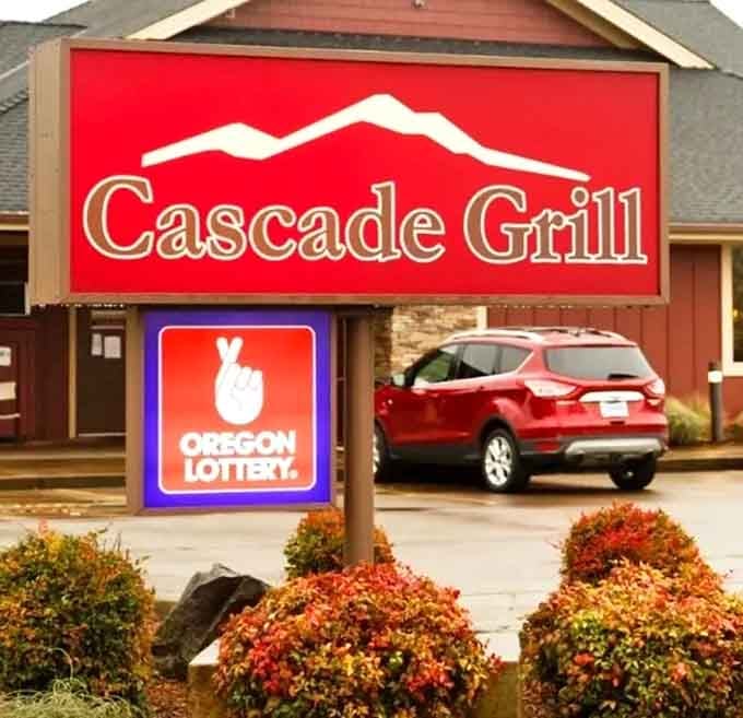 The bold red sign with mountain silhouette announces your arrival at meat paradise&mdash;worth photographing now and framing next to your "after" picture.