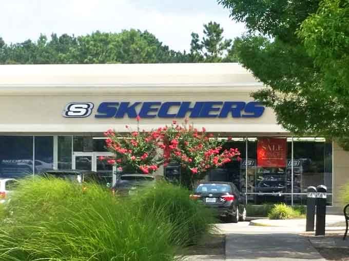 Skechers surrounded by thoughtful landscaping proves comfort can be beautiful. Those flowering shrubs are almost as colorful as the sneakers inside.