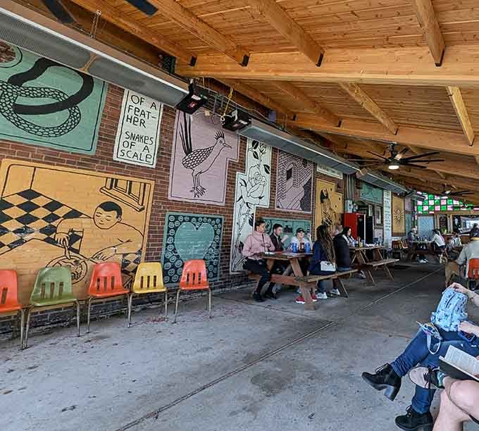 Outdoor patio seating with murals that make you feel like you're dining in an art gallery.