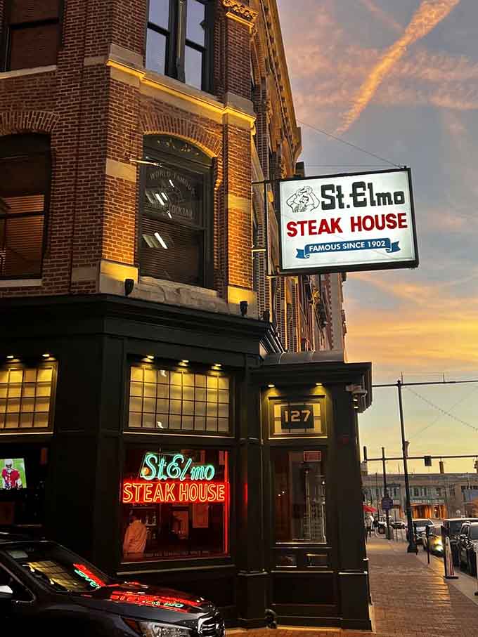 That neon sign glowing against a sunset sky is basically a beacon calling all steak lovers home to happiness.