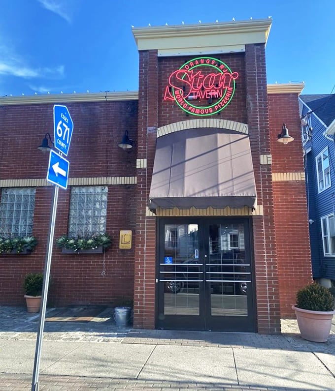 Behind these doors lies thin-crust perfection that's been making pilgrims out of pizza lovers for generations now.