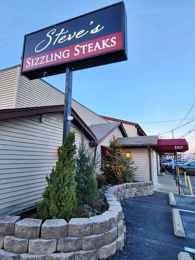 That sign stands proud against blue sky, a beacon for steak lovers navigating Route 17 in search of their next great meal.