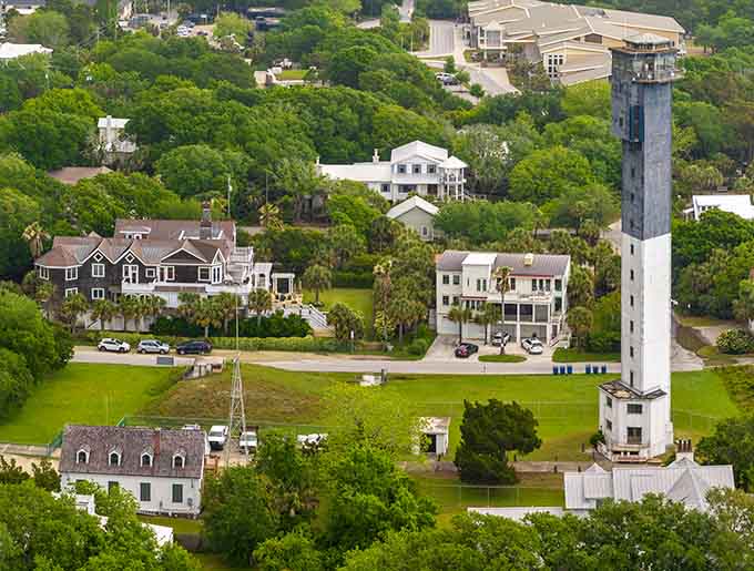 Lush summer greenery surrounds the base while dramatic clouds gather overhead, nature providing the perfect dramatic backdrop for this concrete star.