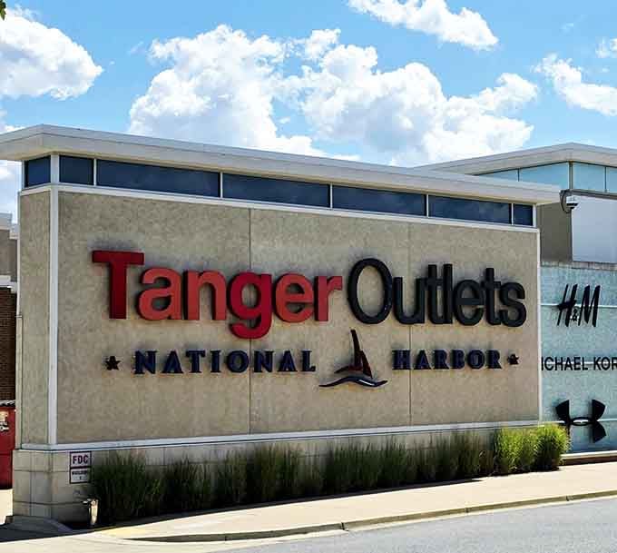 The signage proudly announces your arrival at shopping paradise, where time and money disappear faster than ice cream on a summer day.