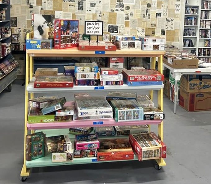 Puzzles stacked on colorful shelves offer analog entertainment for anyone tired of staring at glowing screens all day.