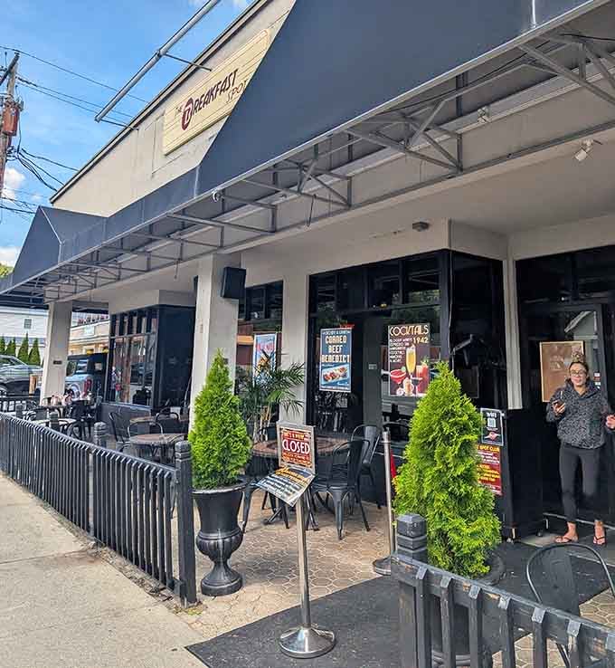 The entrance beckons with outdoor seating, because even time travelers need fresh air with their French toast.