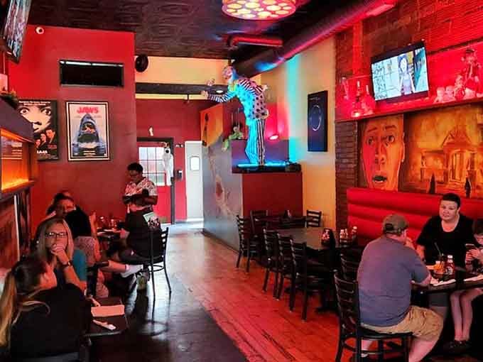 Diners enjoy their meals surrounded by enough horror memorabilia to stock a small museum of nightmares.