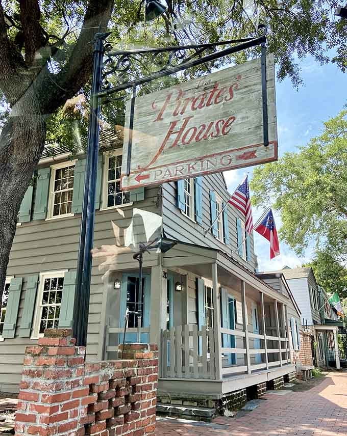 The vintage signage points the way to parking and adventure, though not necessarily in that order of importance.