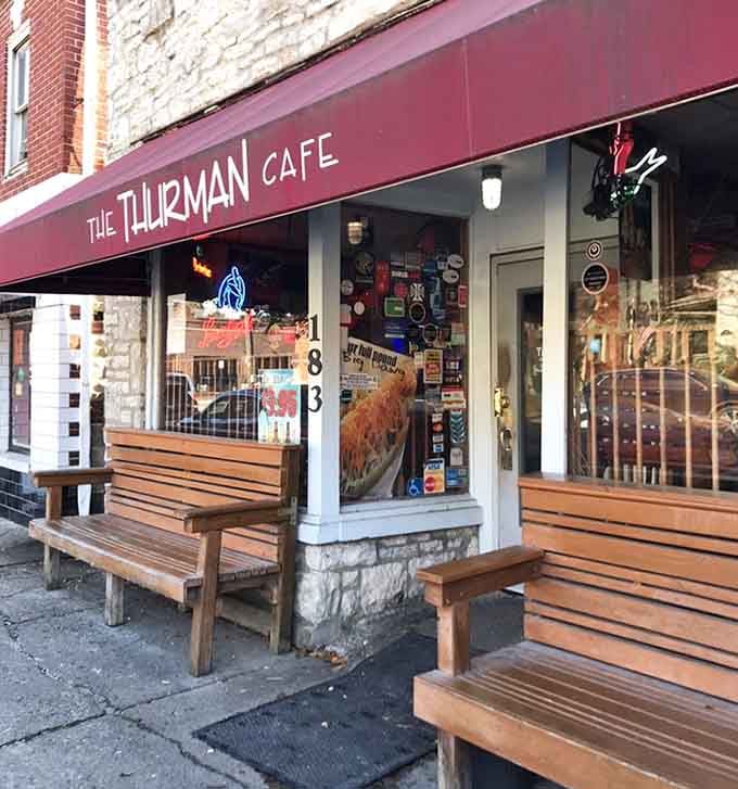 Wooden benches outside offer prime people-watching while you wait, building anticipation with every passing minute.