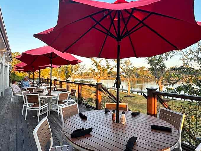 Sunset dining on the deck overlooking the water: this is why people move to coastal Alabama.