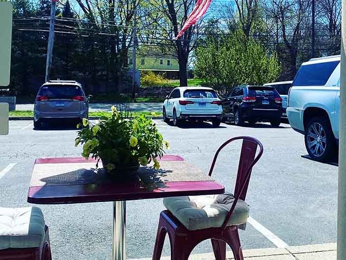 A packed parking lot is the universal sign that locals know something special is happening inside that red barn.