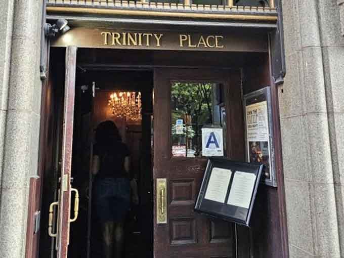 The unassuming entrance on Broadway hides one of Manhattan's most extraordinary dining secrets just steps inside waiting.