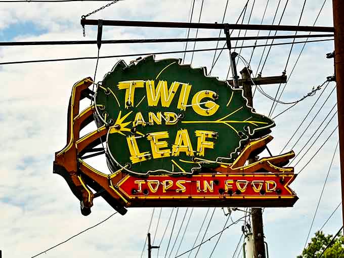 The vintage neon sign declaring "Tops in Food" isn't just advertising, it's making a promise they actually keep.