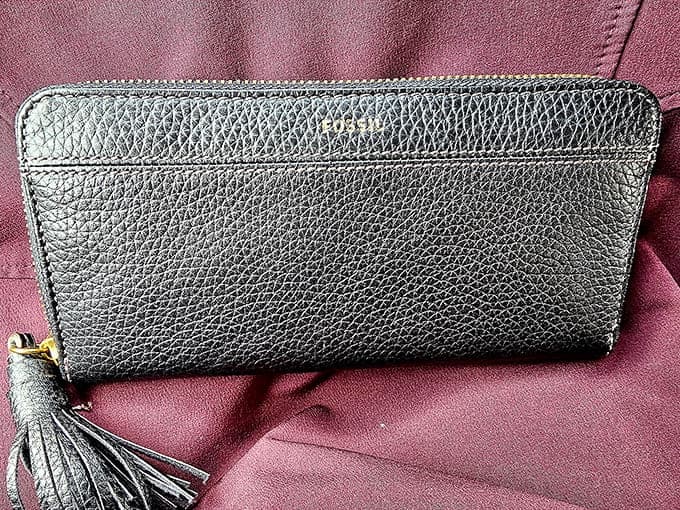 A Fossil wallet that's lived to tell tales, now ready for a second act in someone's back pocket.