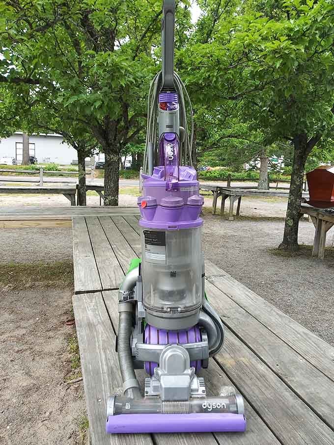 Even the vacuum cleaners have stories here. This purple Dyson probably cleaned up after more family gatherings than it cares to remember.