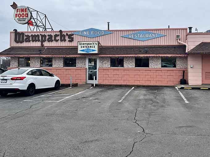 The parking lot welcomes everyone from vintage car enthusiasts to families in minivans seeking authentic diner breakfast.