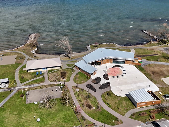 Lakeside pavilion architecture that's equal parts modern and welcoming, where community gatherings actually happen naturally.