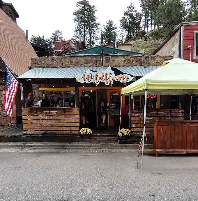 The mountain town storefront beckons with its rustic charm, promising the kind of breakfast that makes early mornings actually worth experiencing.