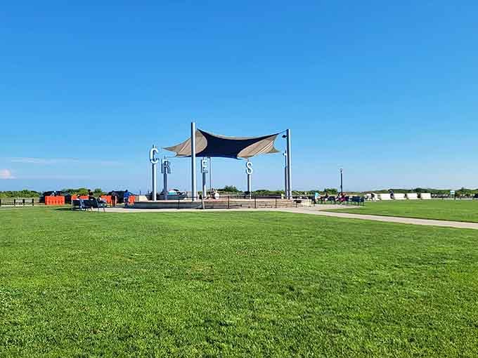 Centennial Park's open green space offers room to run, play, or just lie down after boardwalk overindulgence.