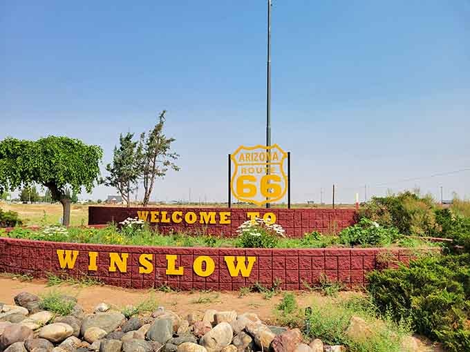 That cheerful welcome sign with its Route 66 shield is your official invitation to discover what you've been missing all along.