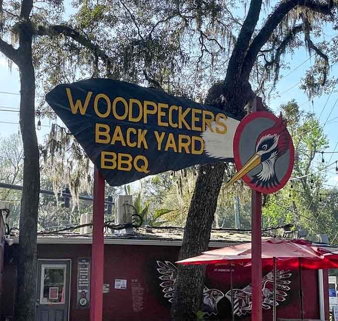 That woodpecker sign points the way to smoky salvation for anyone wise enough to follow its direction off the beaten path.