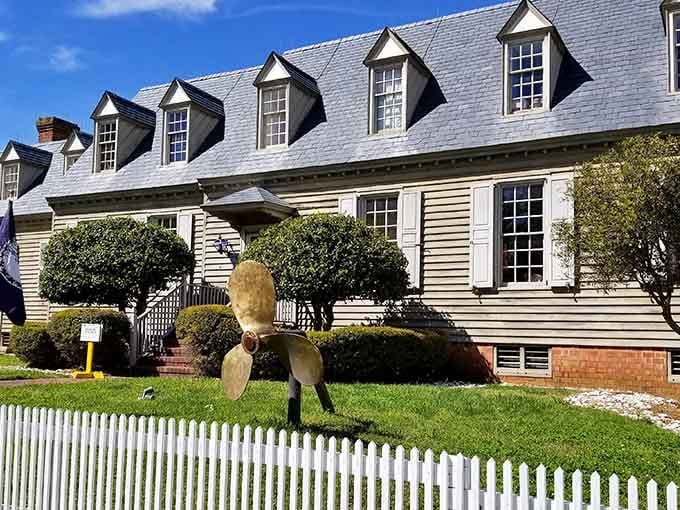 The Watermen's Museum building showcases classic colonial architecture, its dormer windows and manicured grounds welcoming history enthusiasts year-round.