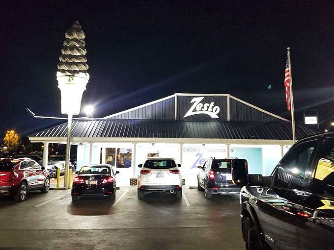 That ice cream cone glowing in the night like a beacon guiding hungry travelers to their destiny.