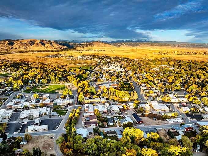 Aerial views reveal a town cradled by mountains, golden trees, and possibilities for starting fresh.