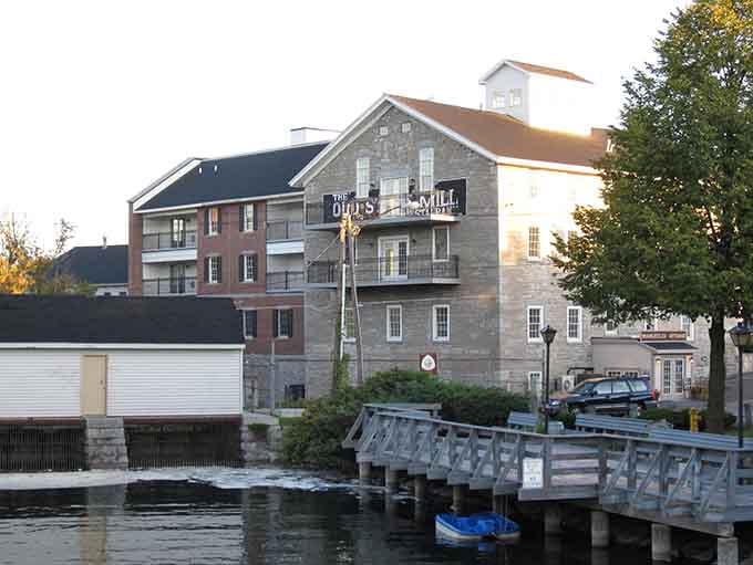 Sunset bathes the historic mill in golden light, transforming this architectural landmark into a painting come to life—Norman Rockwell would've needed extra canvas.