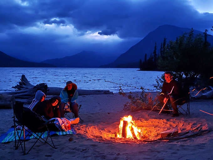 As twilight embraces the lake, campfire stories begin their ancient dance&mdash;where marshmallows meet their delicious doom and city worries dissolve into starlight.