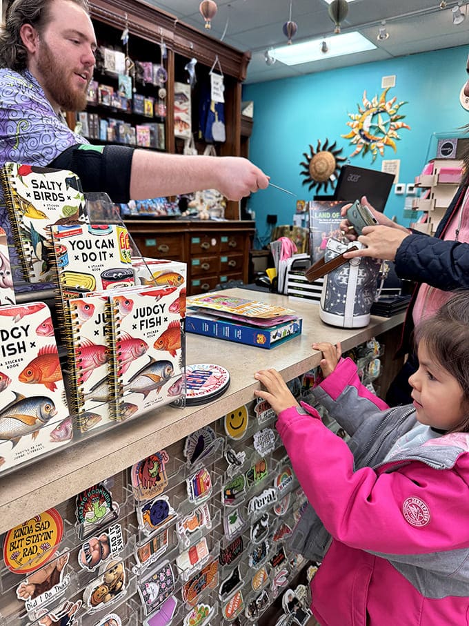 The magical moment of purchase, where friendly staff turn browsing into belonging with recommendations that feel like friendship.