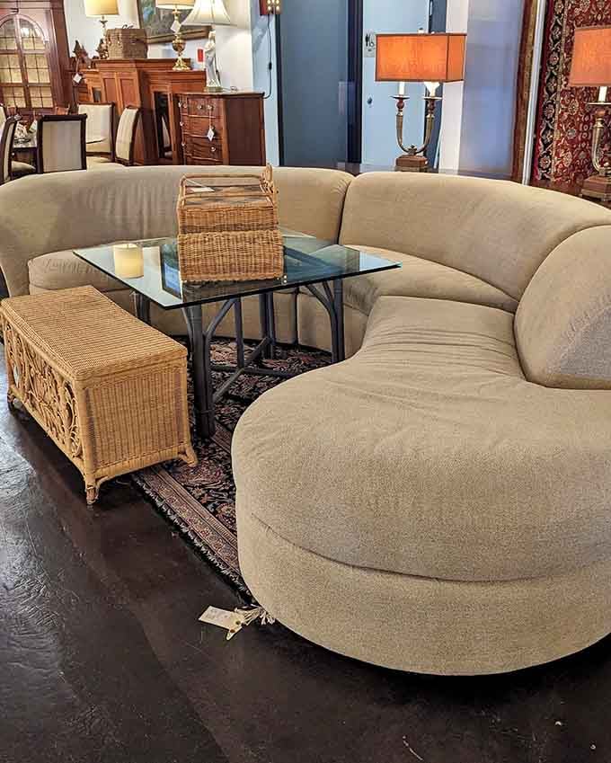 The curved sectional that proves comfort and style aren't mutually exclusive. Like a hug in furniture form, waiting for someone to sink into its embrace.