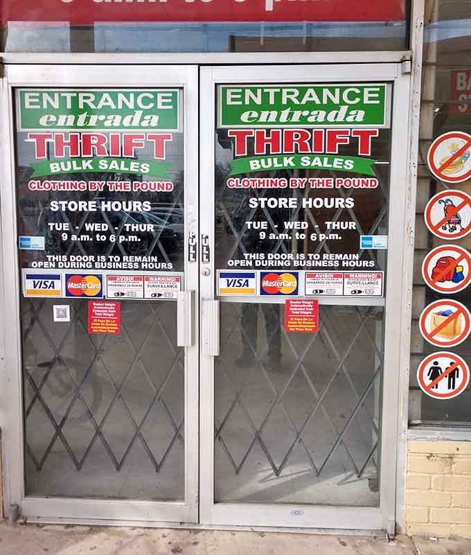 The gateway to bargain paradise. Those "clothing by the pound" signs hint at the bulk-buying treasures waiting for wholesale hunters inside.