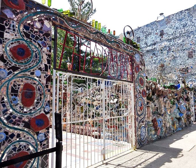 The gateway to wonderland. This entrance promises that ordinary life stays outside while imagination reigns within these mosaic walls.