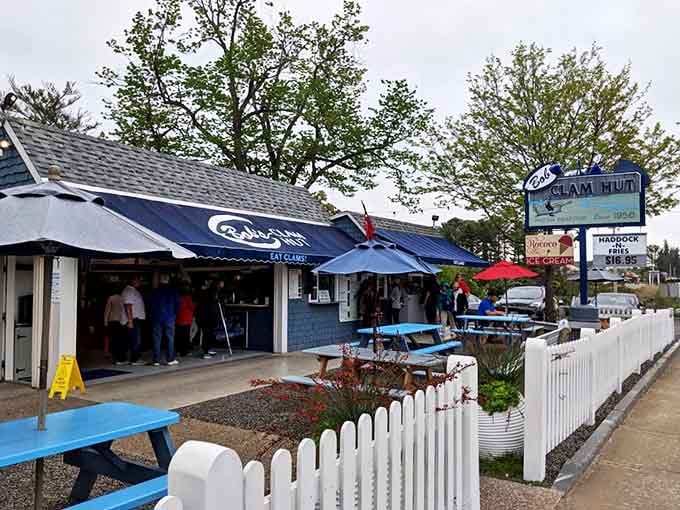 Summer at Bob's means lines of eager seafood pilgrims. The blue picnic tables and white picket fence create the quintessential Maine seafood experience.