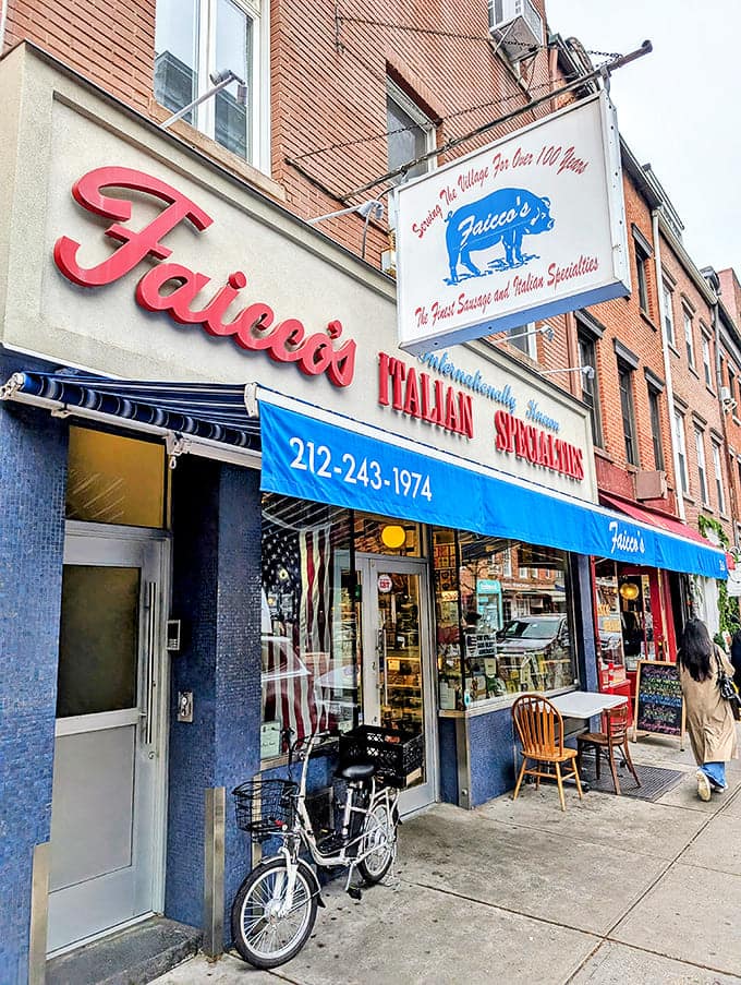 The blue awning and vintage signage announce what locals have known for generations: this isn't just a deli&mdash;it's a Greenwich Village institution worth traveling for.