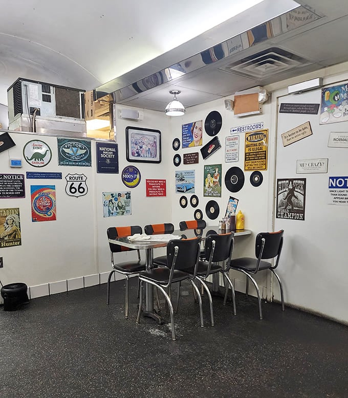 Every inch of wall space tells a story&mdash;vintage records and Route 66 signs creating the perfect backdrop for your coffee refills.