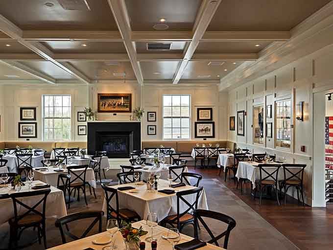 The dining room's elegant coffered ceiling and warm wood tones create the perfect backdrop for the main event&mdash;whatever delicious dish you're about to devour.